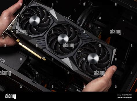 Installing Video Card In An Open Case Of Personal Computer Graphics