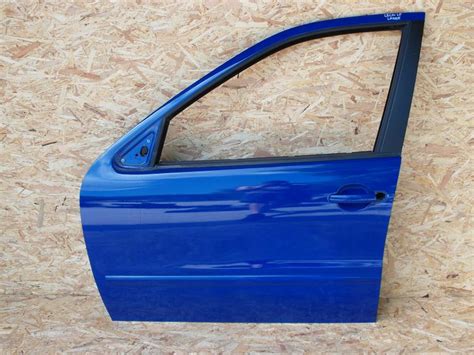 DRZWI PRZÓD PRZEDNIE LEWE SEAT LEON I TOLEDO II 7546077619