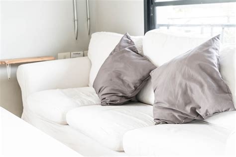 Premium Photo Grey Pillow On Sofa