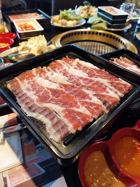 Premium Photo Raw Beef Slice For Barbecue Or Japanese Style Yakiniku