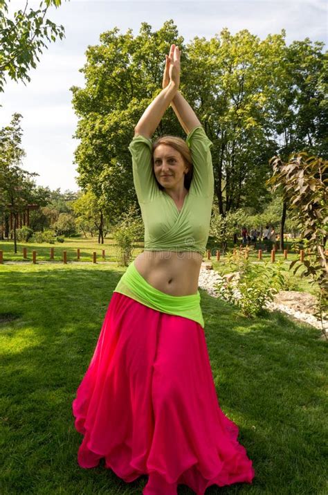 Blonde Girl Dancing Belly Dance Dancing Girl In The Park Stock Image