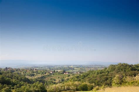 Panorama Of A Typical European Countryside Landscape Farms