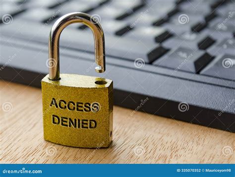 Access Denied Text Engraved On Padlock With Keyboard Background Password And Use Access Concept