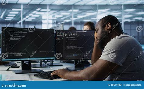 Overworked Engineer Falling Asleep While Typing On Computer In Server Hub Stock Image Image Of