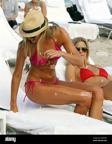 Stacy Keibler Flaunts Her Perfect Figure In A Tiny Hot Pink Bikini