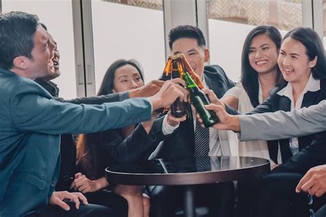 Premium Photo Asian People Group Drinking In Party Congratulation