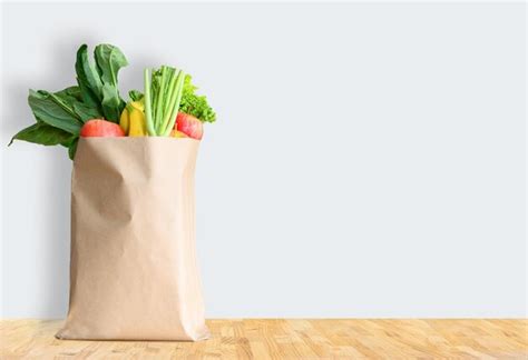 Premium Photo Close Up Of Vegetable Paper Bag On Table
