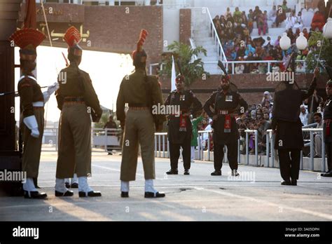 Indian Border Security Force Soldiers And Pakistani Counterpart Doing Parade Before Start