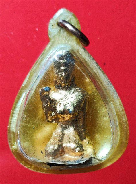 นางกวักเลี่ยมเดิมหลวงปู่ทิมวัดละหารไร่ Ennxo