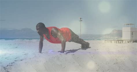 Image Of Spots Over African American Man Exercising At Beach Stock