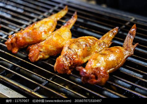 在烤炉上面的鸡翅包饭高清图片下载 红动中国