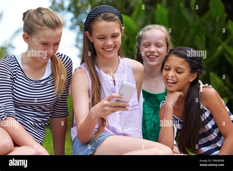 Just Being Real With Each Other A Young Girl Showing Her Friends