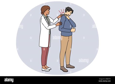 Physiotherapist Help Male Patient With Backache Suffering From Spasm