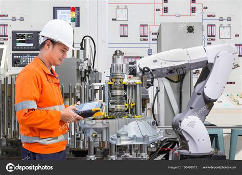 Engineer Programming Automated Robotic Industry In Automotive Industry