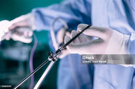 Portrait Of A Professional Surgeon Performing An Invasive Operation On