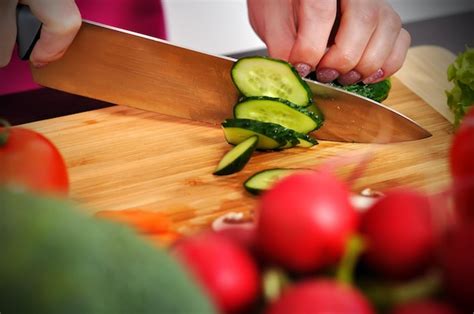Premium Photo Hand Cuts Cucumber