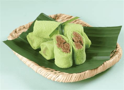 Malaysian Kuih Dadar Pandan Crepes With Coconut Filling Delishglobe