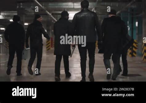 Back View Full Footage Of Brutal Assertive Bandits Walking Down