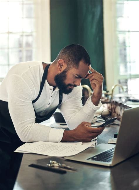 Something Doesnt Seem Right A Handsome Young Barber Feeling Stressed