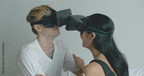 Lover Using Virtual Reality Trying To Have Sex In Bed Touching Man Chest Caucasian Male With