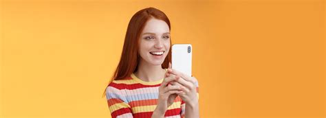 Free Photo Redhead Girl Having Fun Recording Hilarious Friend Actions