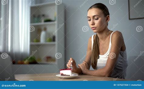 Anorexic Girl With Measuring Tape Royalty Free Stock Image