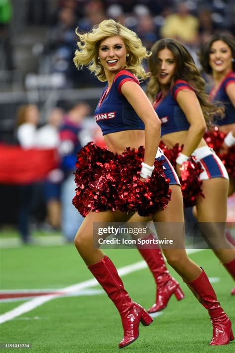Houston Texans Cheerleaders Rev Up The Crowd During The Football Game