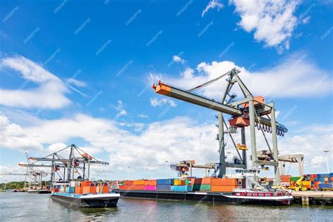 Premium Photo Container Ship And Logistics Crane Loading A Container