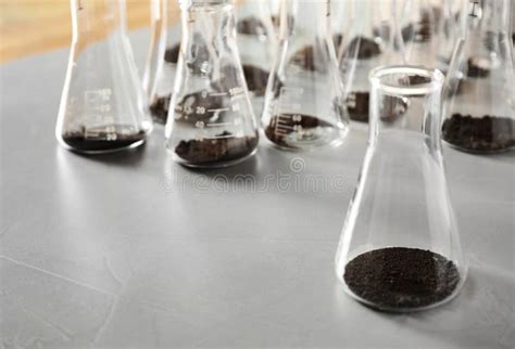 Glassware With Soil Samples On Grey Table Stock Image Image Of Glassware Experiment 158976677