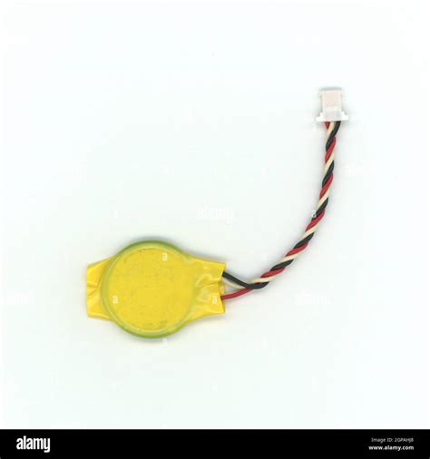 Cmos Bios Battery For A Laptop Computer Over White Background Stock