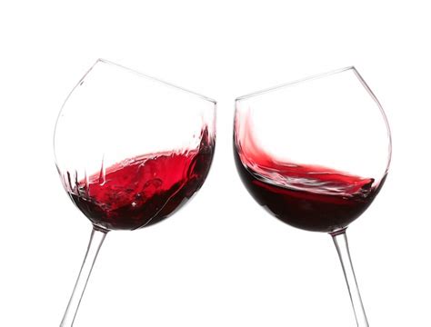 Premium Photo Red Wine Swirling In A Goblet Wine Glass Isolated On A