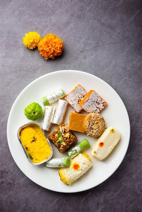 Premium Photo Indian Assorted Sweet Mithai Barfi In A Group