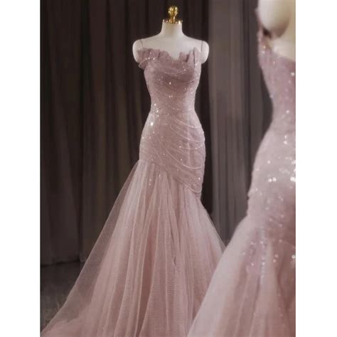 Light Pink Tulle Prom Dress With Spaghetti Strap And Sleeveless Design