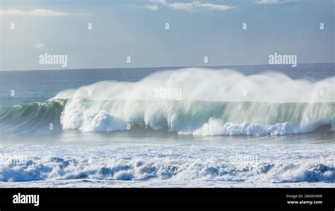 Wave Ocean Wall Of Sea Water Spray Power Crashing Energy Towards Beach
