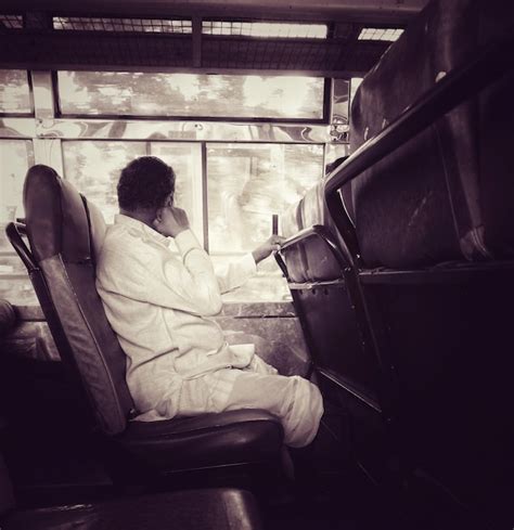 Premium Photo Woman Sitting On Seat In Bus