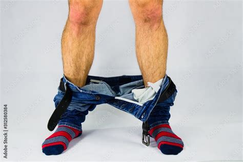 Man Has His Pants And Underwear Down At The Anklesman In Front Of