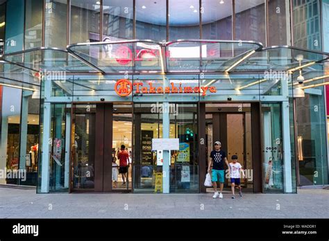 Customers Enter The Shanghai Takashimaya Department Store In Shanghai