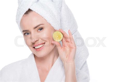 Woman With Clean Skin Holding Slice Of Lime Isolated On White Stock