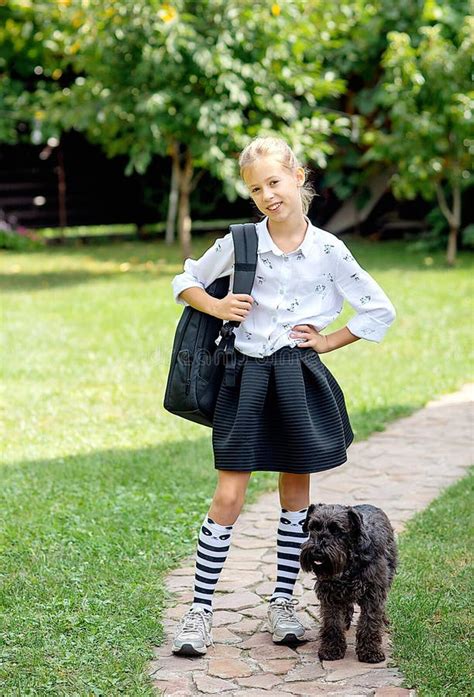 Back To School Cute Girl With Backpack Going To School With Fun Stock