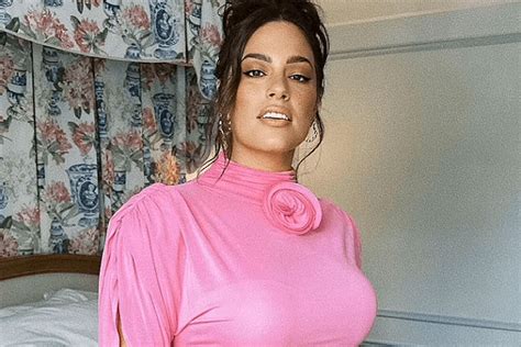 Putting On A Leggy Display In A Pink Mini Dress Ashley Graham Poses