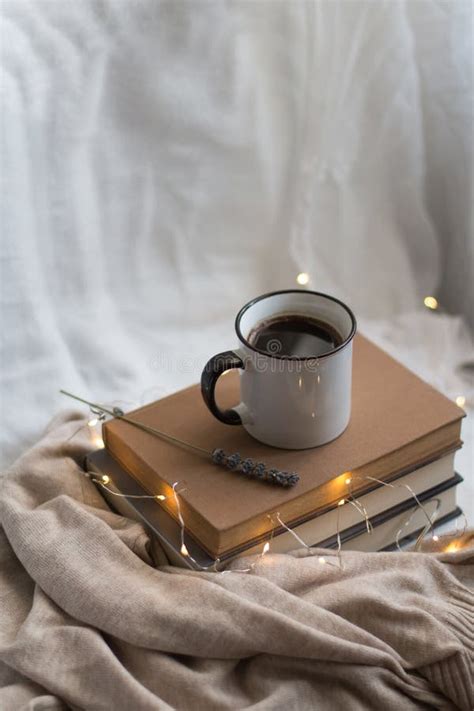Ideal Relaxation In A Cozy Home With Coffee And Reading Stock Photo