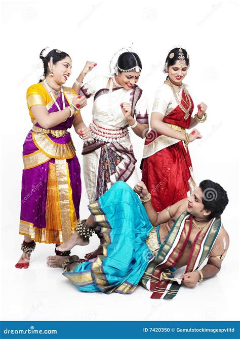 Two Indian Classical Odissi Dancers Striking A Pose In Front Of Mukteshvara Templebhubaneswar