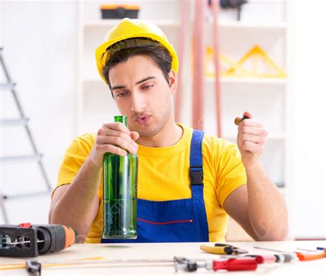 The Drunk Engineer Working In The Workshop Drunk Engineer Working In