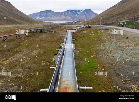 Galvanized Steel Pipeline Leading To The Village Of Longyearbyen