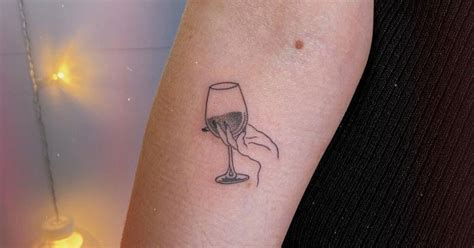 Wine Glass Tattoo Located On The Inner Forearm