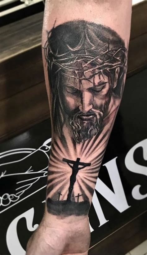 Jesus On Cross Forearm Tattoo