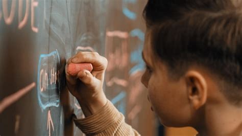 Premium Photo Panorama Shot Of Smart Boy Writing Engineering Prompt
