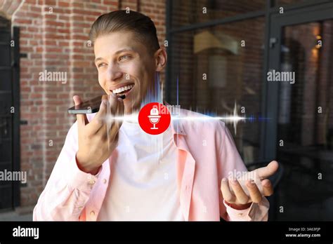 Young Man Recording Voice Message Via Smartphone Outdoors Illustration Of Microphone And Sound