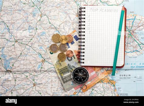 Travel Concept With Notebook Written Trip Planning Compass And Money