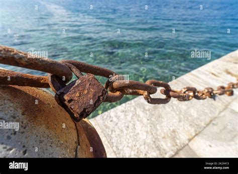 A Rusted Chain And An Old Rusty Lock Stock Photo Alamy